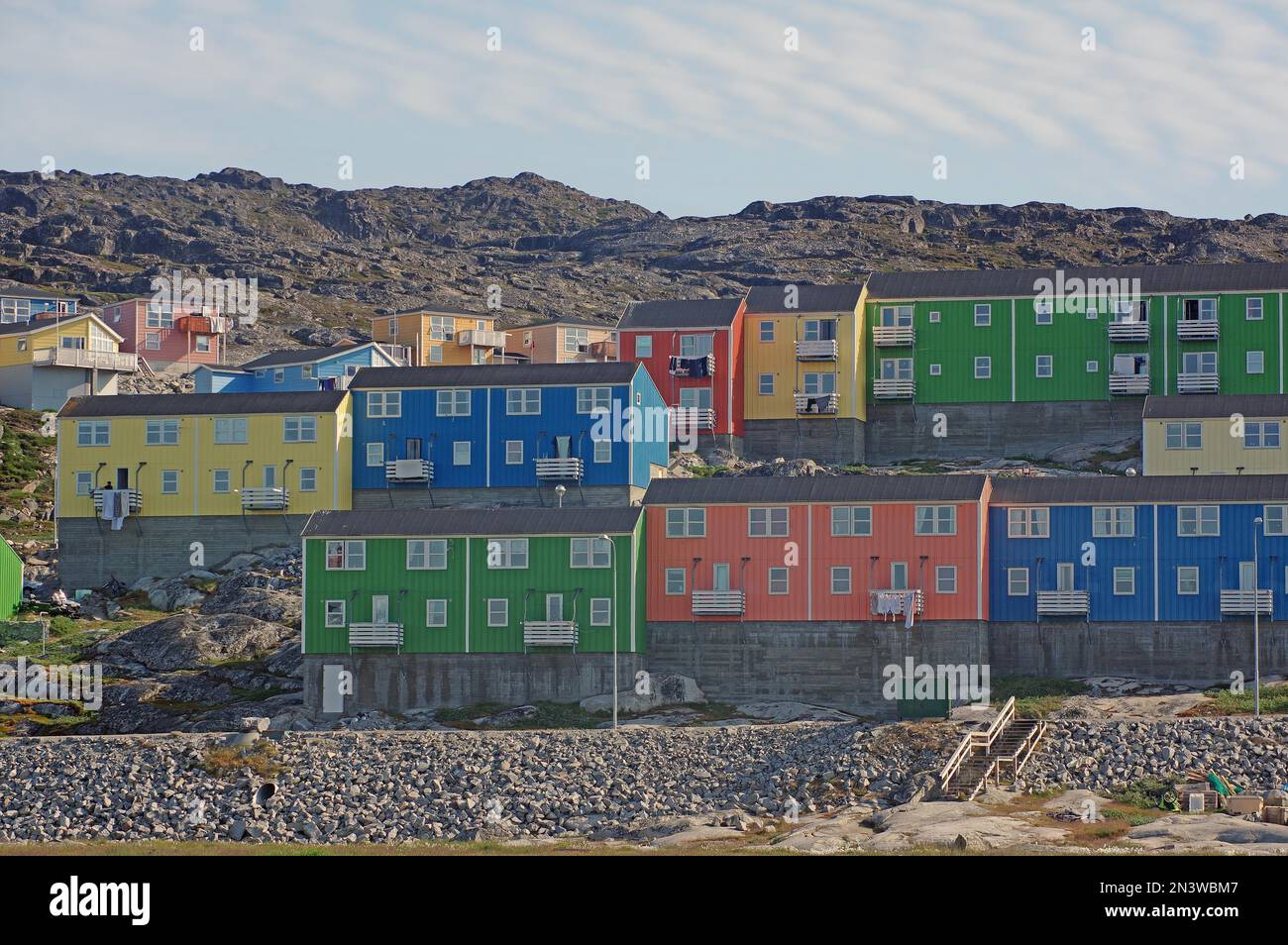Residential houses, terraced houses in different colours in a barren ...