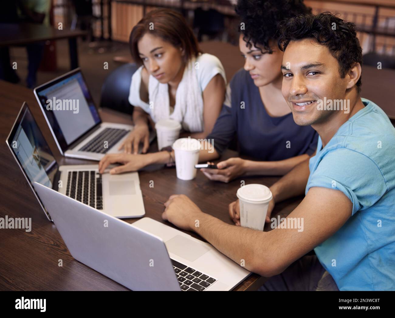 We make studying look easy. A group of students using a laptop to ...
