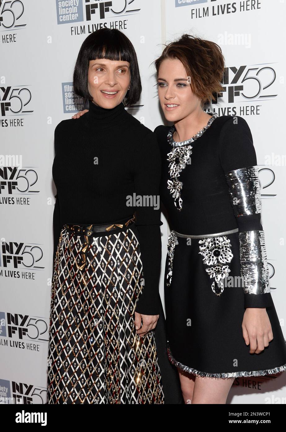 Actors Juliette Binoche, left, and Kristen Stewart attend the "Clouds ...