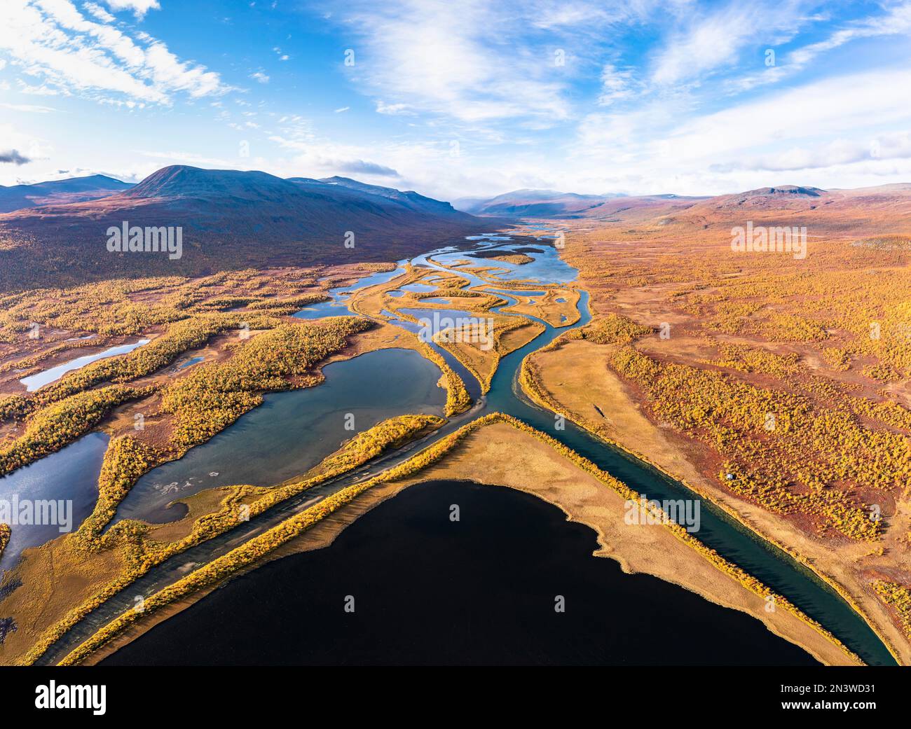 Autumn landscape with river, lakes and mountains, Visttasjohka river ...