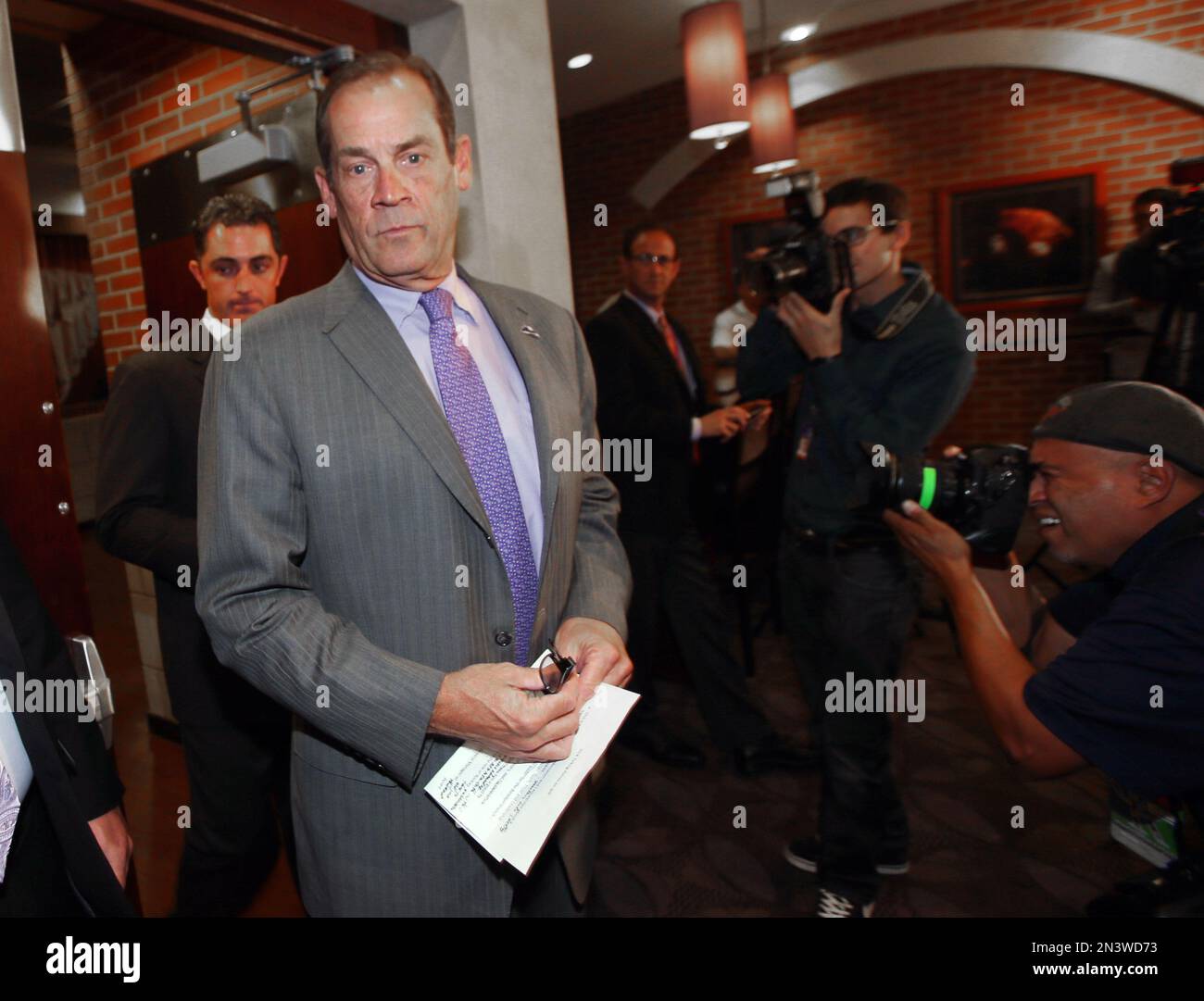 Colorado Rockies co-owner Dick Monfort, front, leads in the team's new ...
