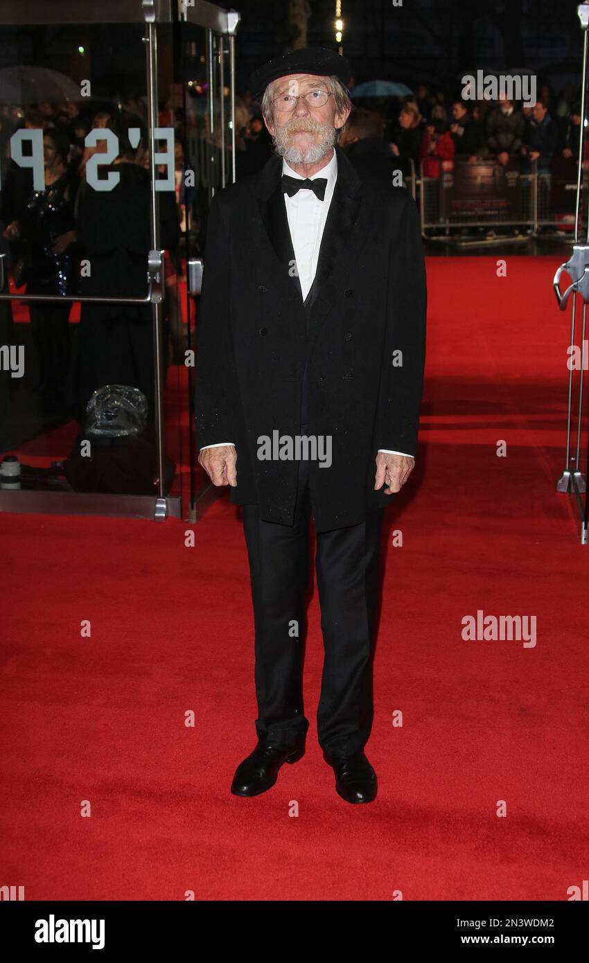 British actor John Hurt poses for photographers during the premiere of ...