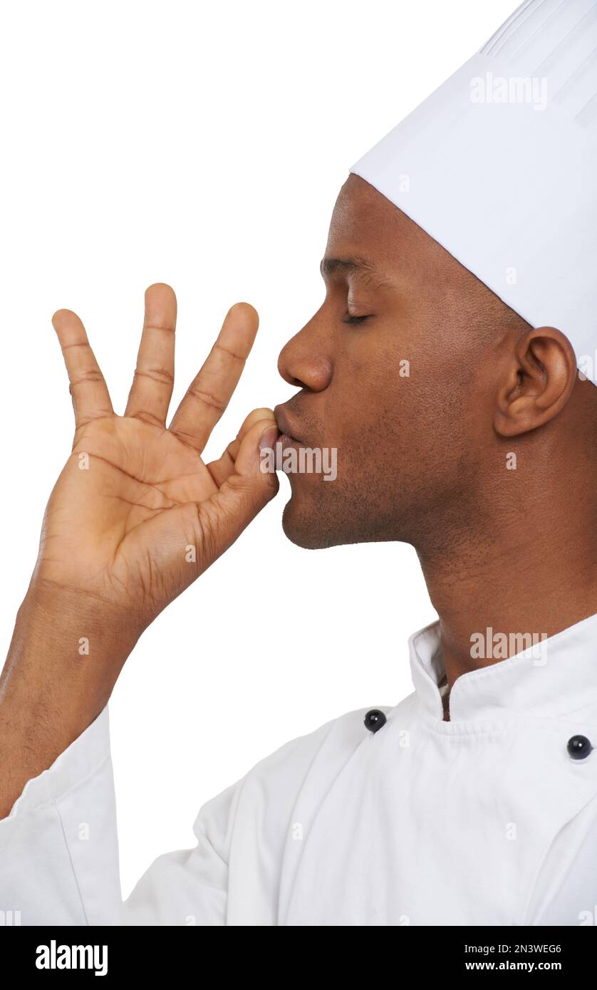 Magnifique. Profile of an african chef kissing his hand in perfection ...