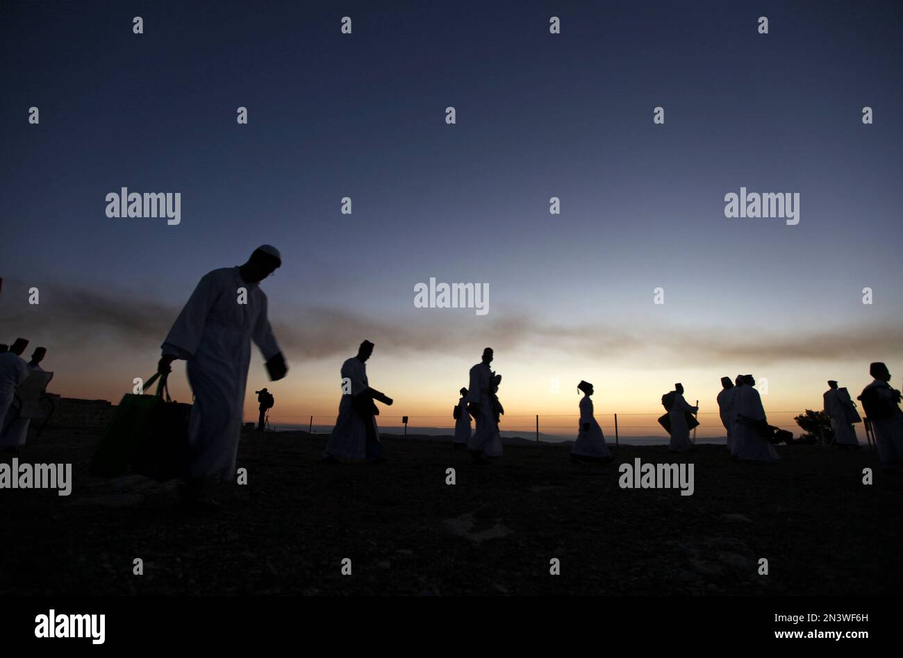 Members of the ancient Samaritan community walk during a pilgrimage ...