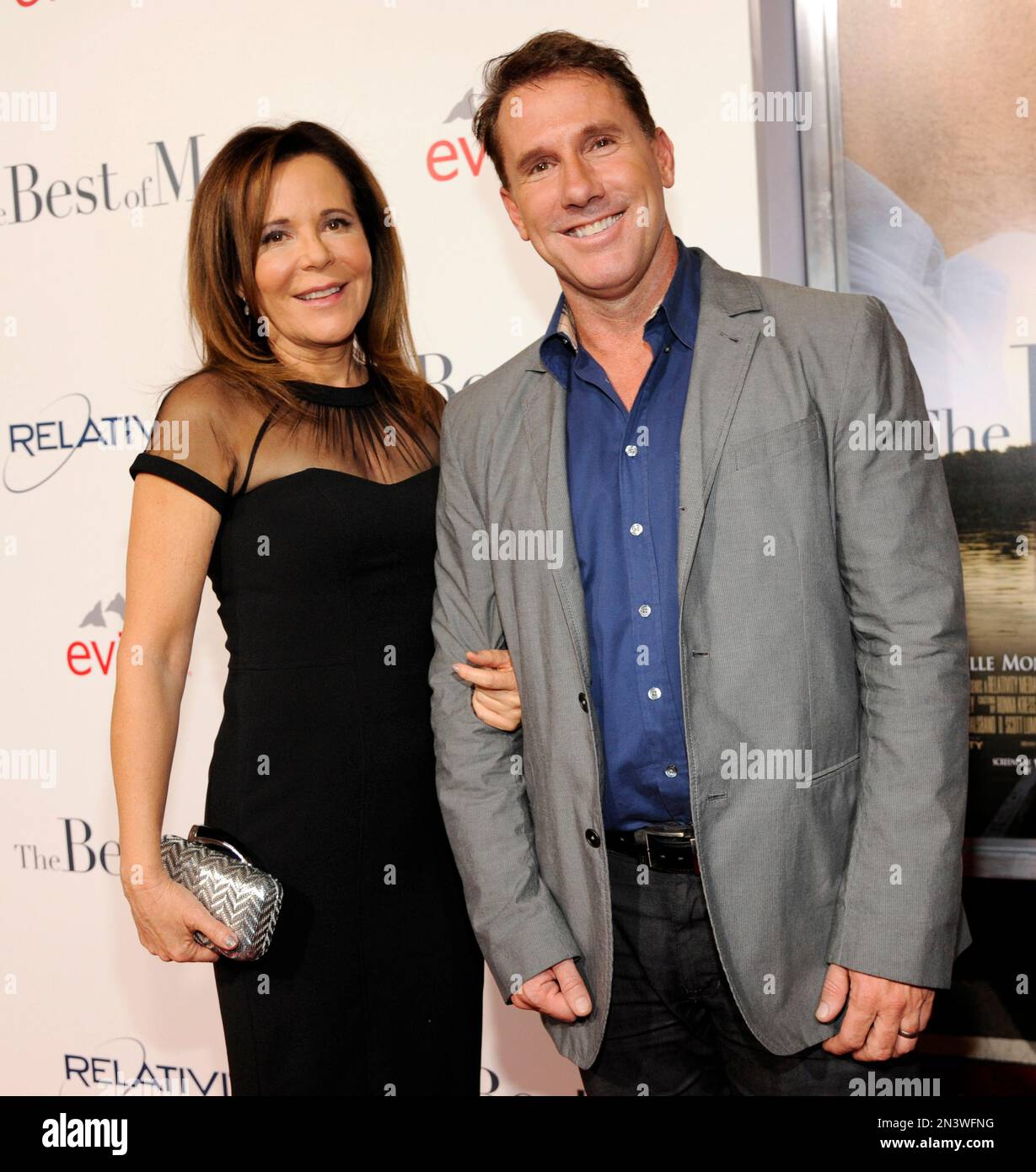 Author Nicholas Sparks and producer Denise Di Novi pose together at the ...