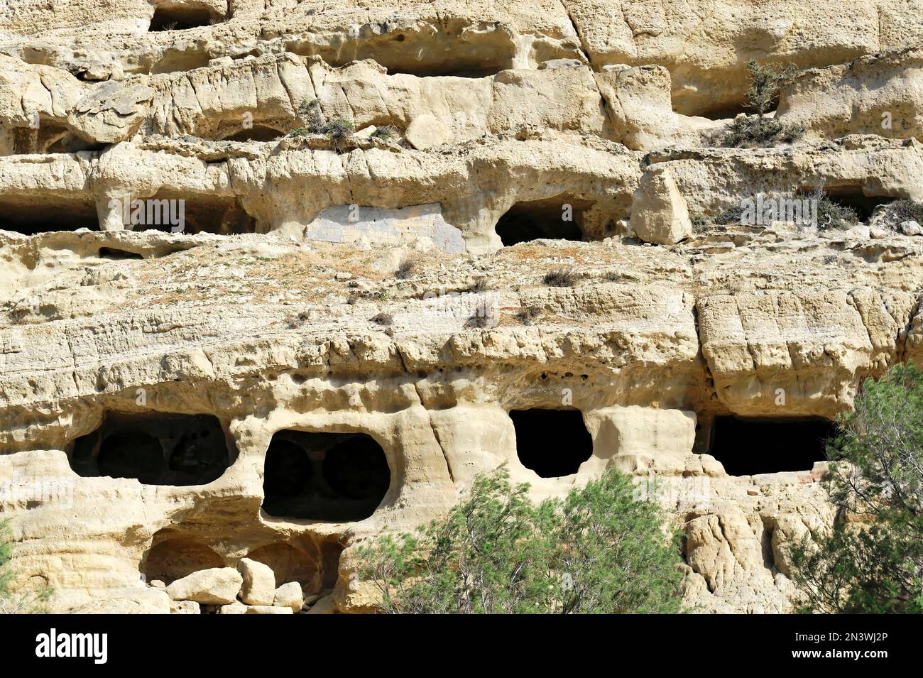 Rock caves, residential caves, Matala beach, Matala, Crete, Greece ...