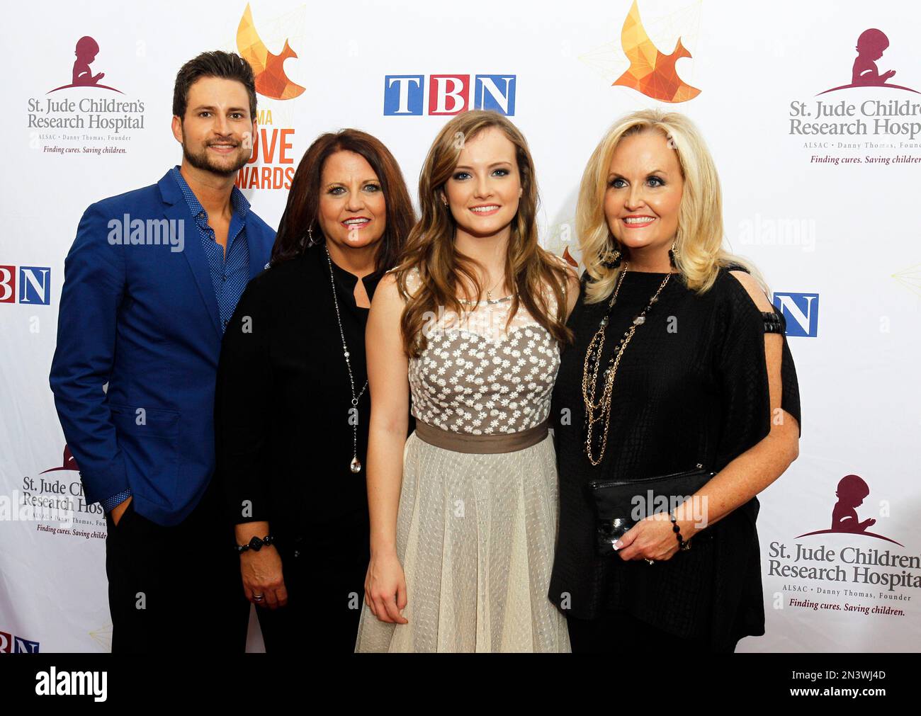 Karen Peck Gooch, right, Jeff Hawes, left, Susan Peck Jackson, second ...