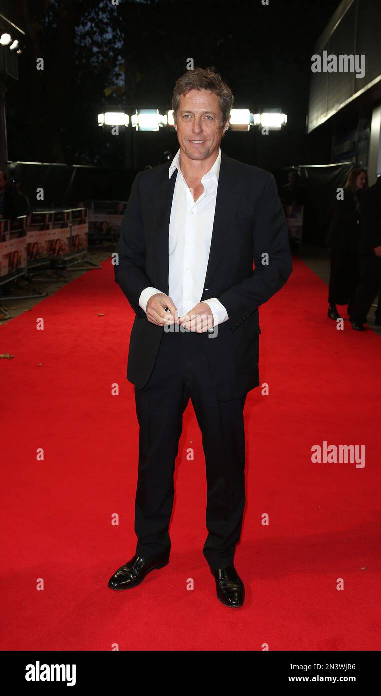 British actor Hugh Grant poses for photographers upon arrival at at the ...