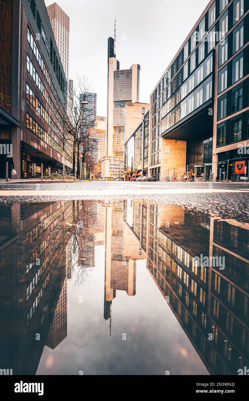 Reflection of the Commerzbank skyscraper or Commerzbank Tower at rain ...