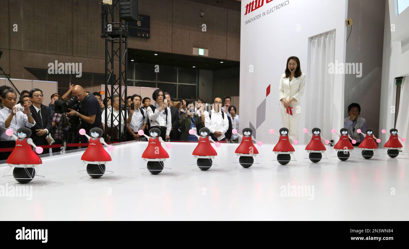 Robot cheerleaders developed by Murata Manufacturing perform ...