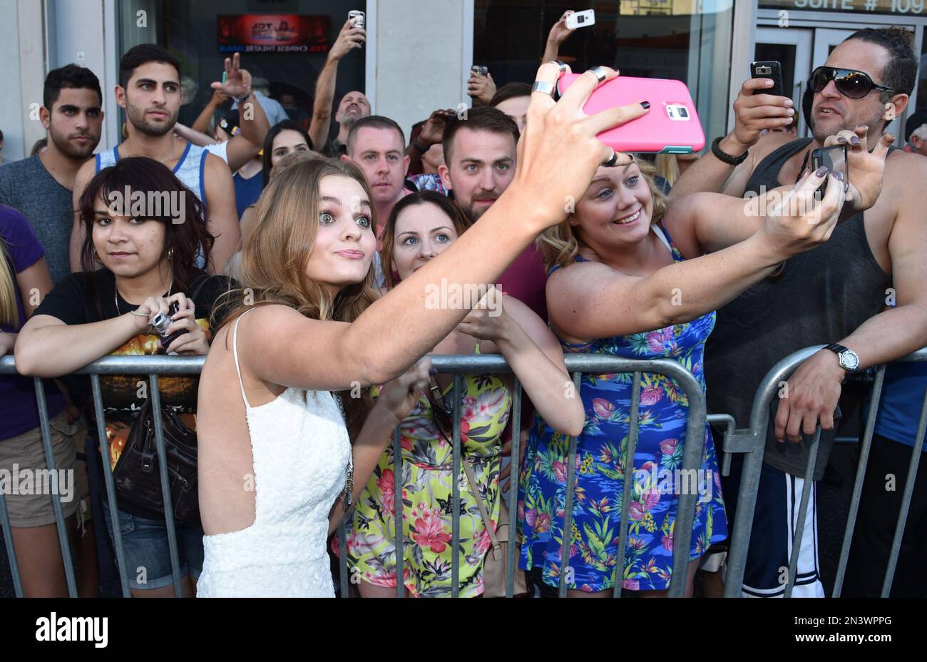 Kerris Dorsey takes a selfie with fans at the world premiere of ...