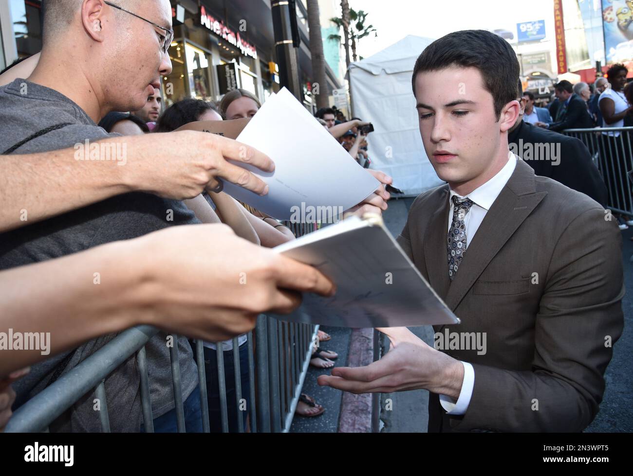 Dylan Minnette signs autographs at the world premiere of "Alexander And ...