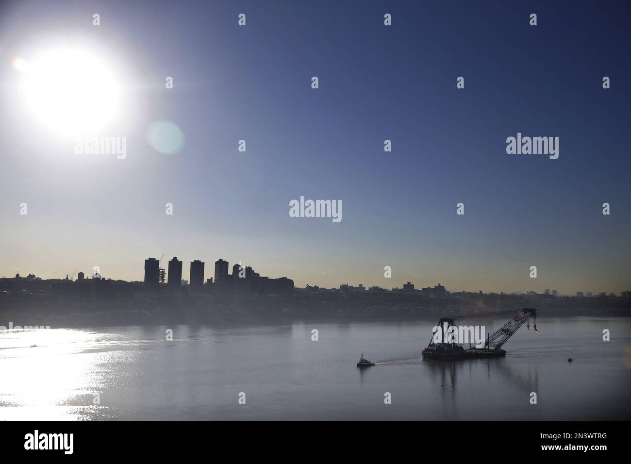 A large crane named the Left Coast Lifter heads north up the Hudson ...