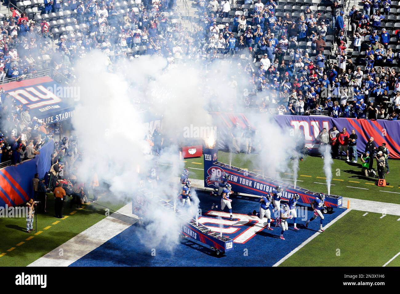 New York Giants players take the field prior to an NFL football game ...