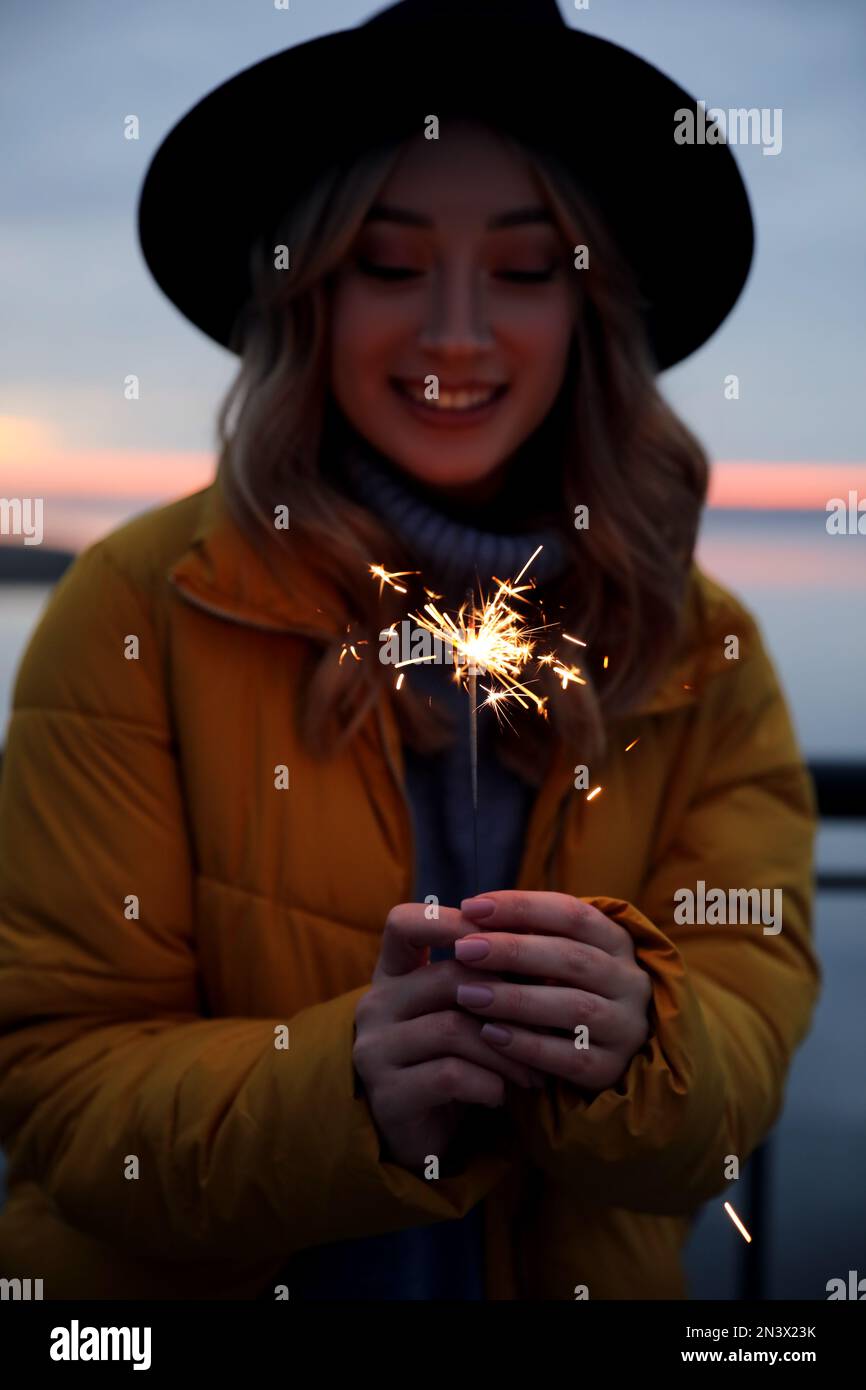 Woman burning clothes hi-res stock photography and images - Alamy