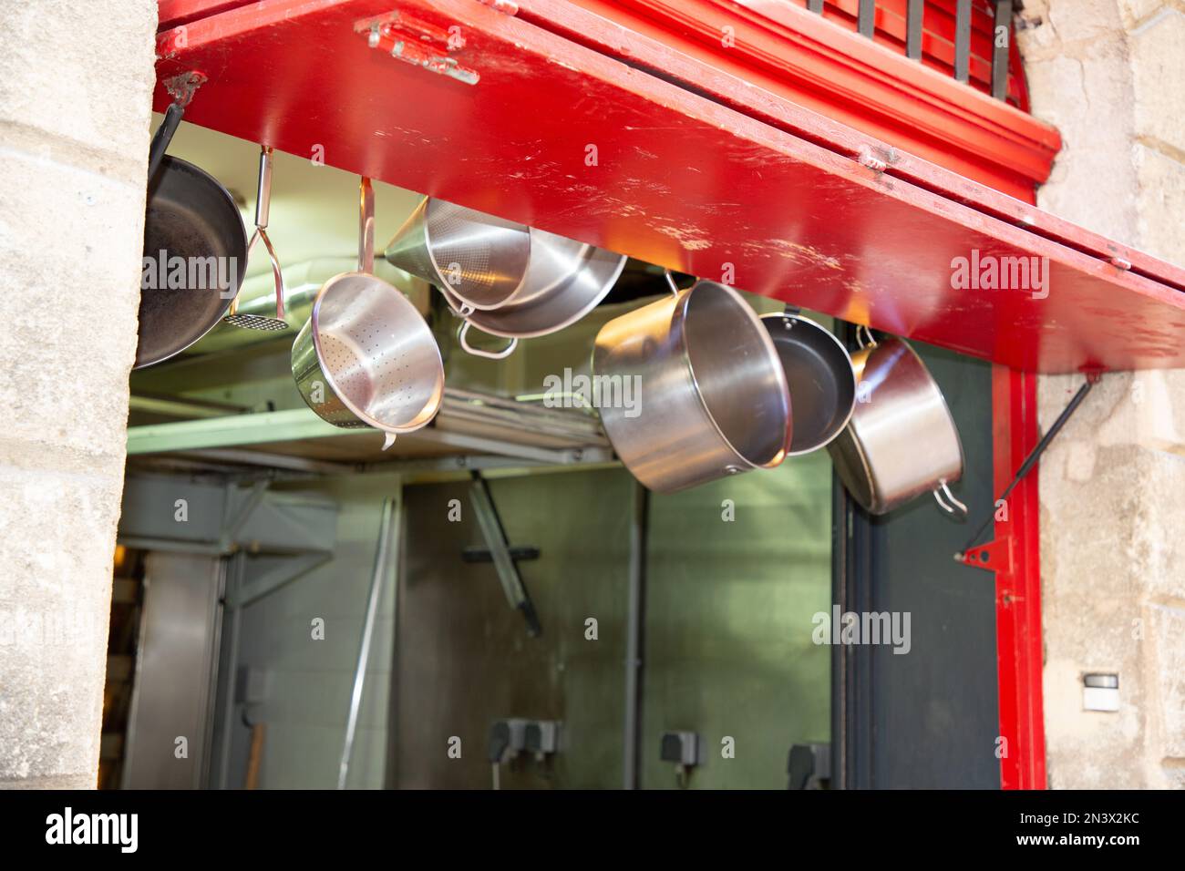 kitchenware set pans hanging in restaurant kitchen stainless steel cookware in street take away ...