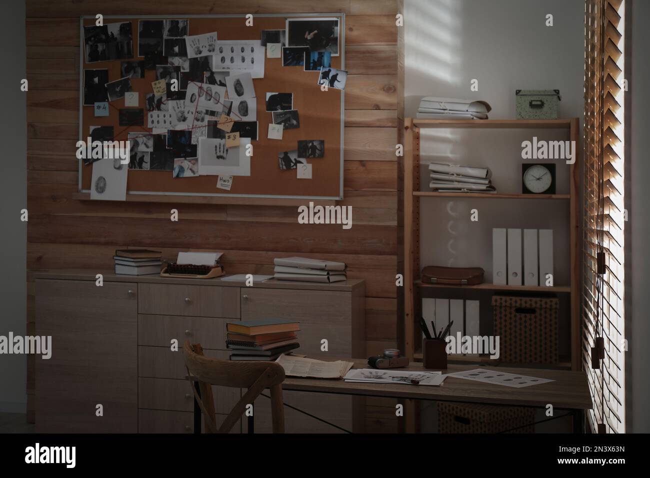 Detective office interior with evidence board on wall Stock Photo - Alamy