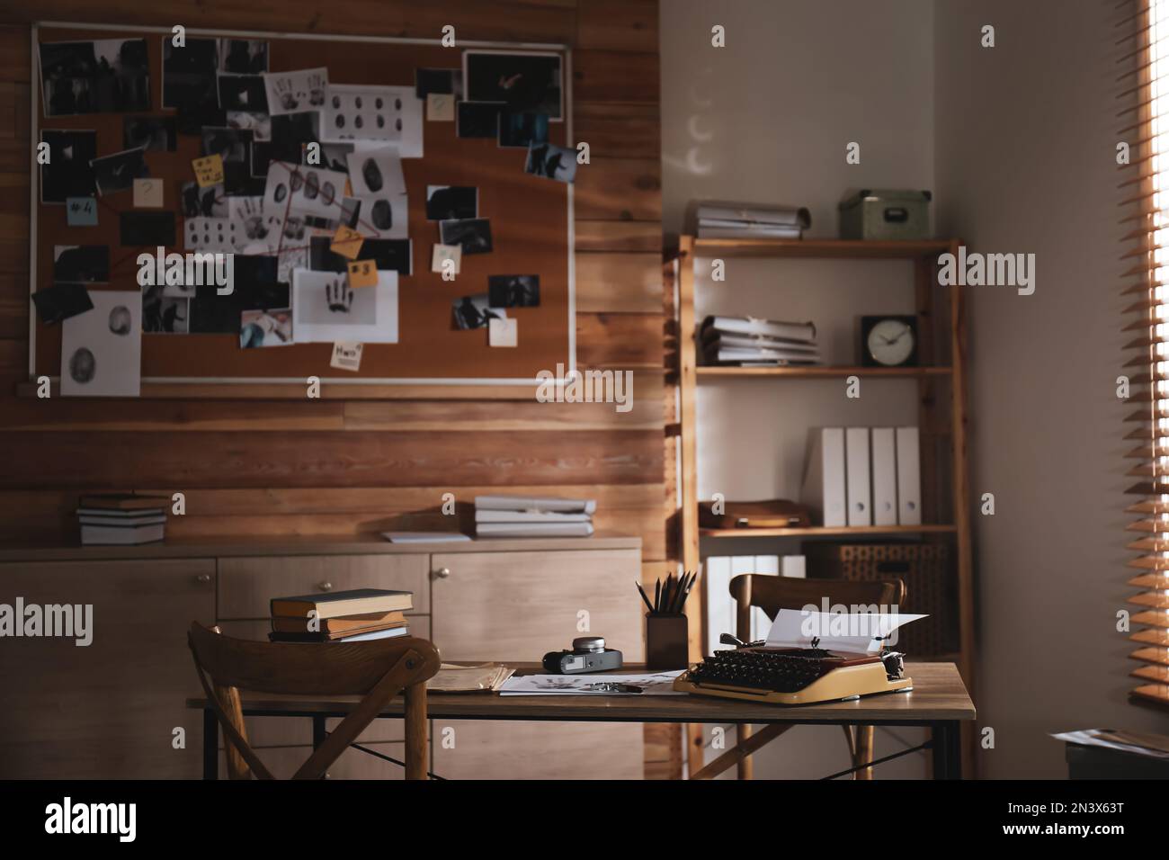 Detective office interior with evidence board on wall Stock Photo - Alamy