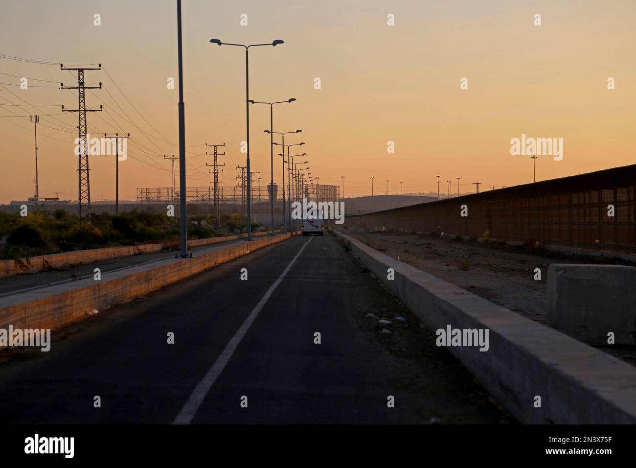 Palestinian buses carry pilgrims as they wait to cross Erez border ...