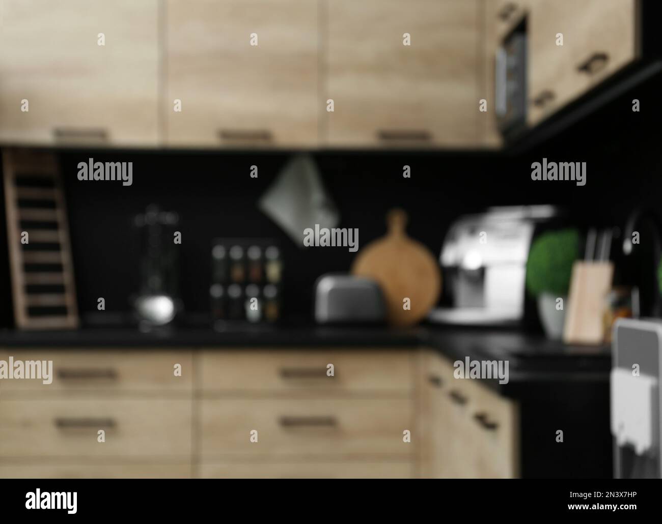 Blurred view of kitchen interior with modern furniture Stock Photo - Alamy