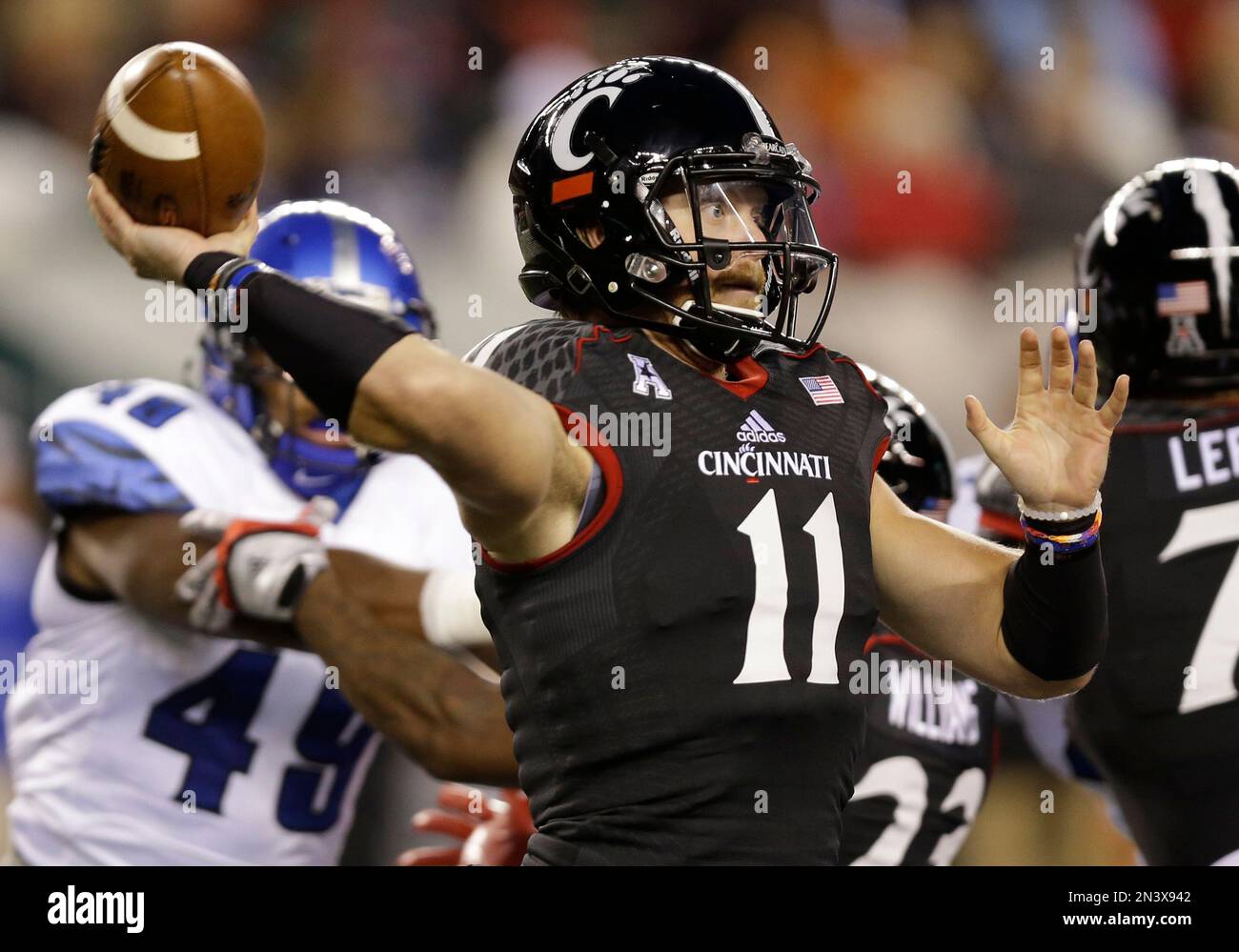Cincinnati quarterback Gunner Kiel (11) passes against Memphis in the ...