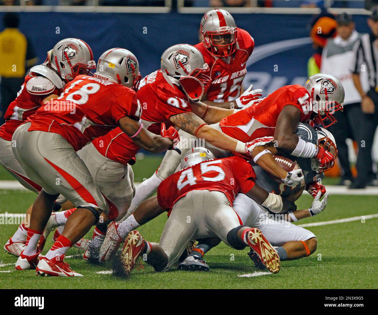 UTSA running back Brandon Armstrong is tackled by the New Mexico ...