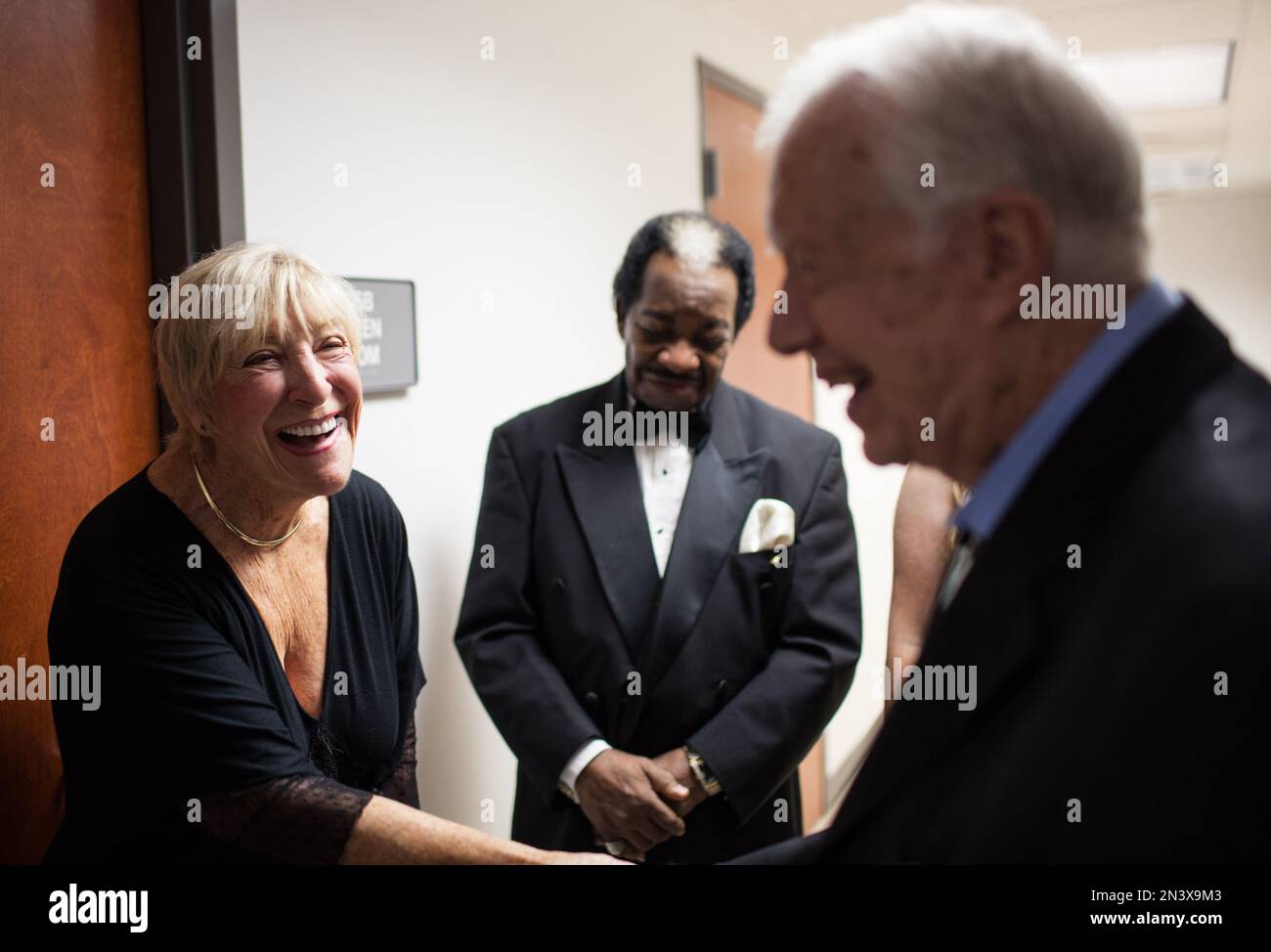 Sherri Morris, left, greets former President Jimmy Carter at his 90th ...