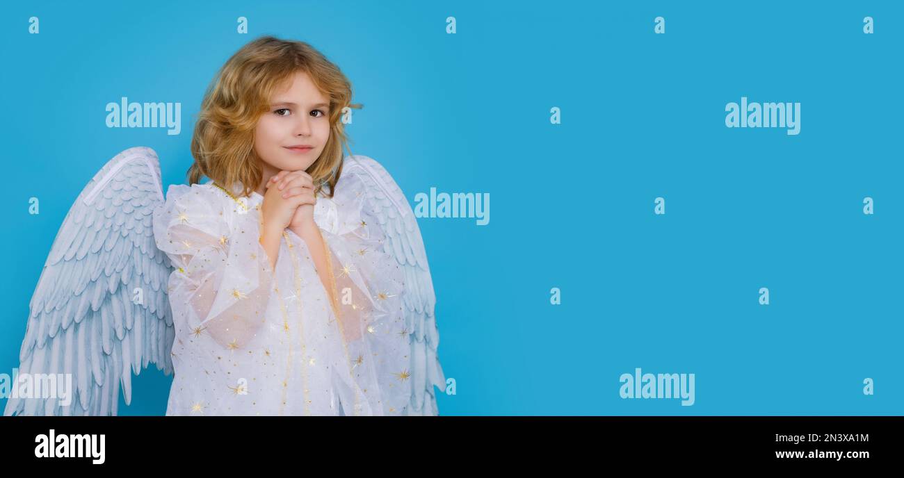 Angel child. Isolated studio shot. Cute kid with angel wings. Wide ...
