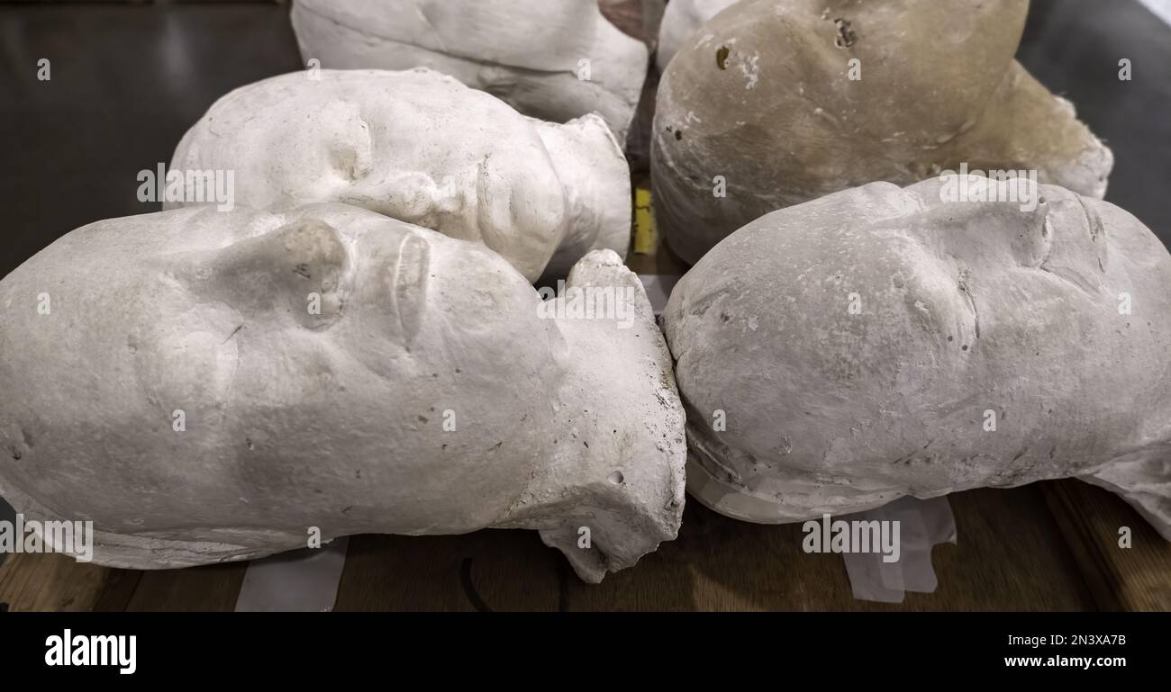 Modern art detail, realistic sculpted faces Stock Photo - Alamy