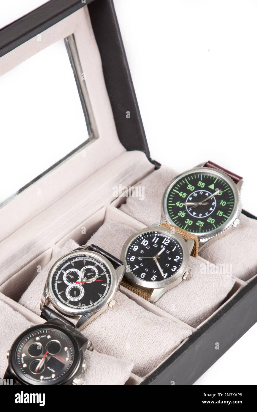 Open black gift box with luxury watches isolated on white background ...