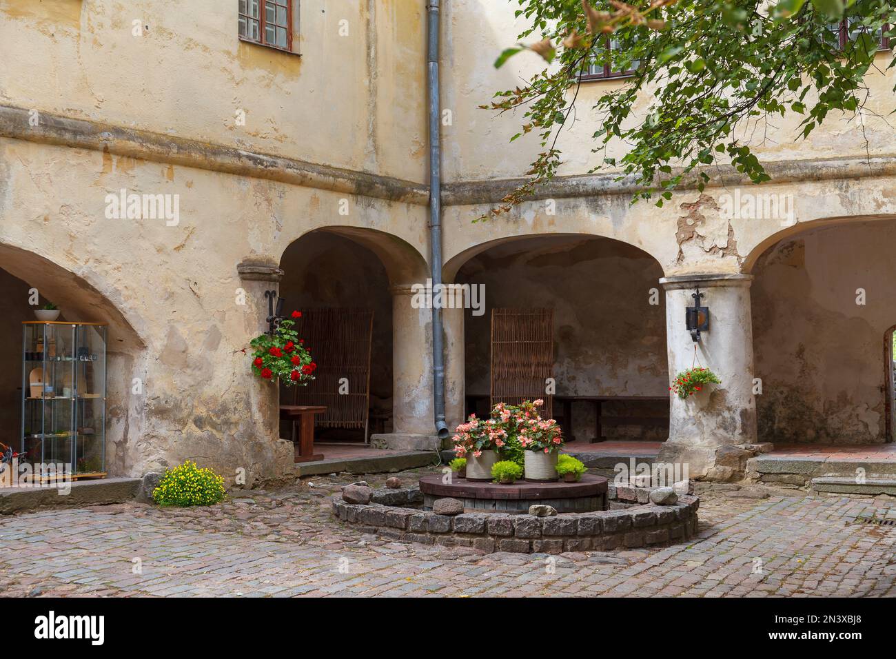 Autumn in medieval convent yard in old European town. Jaunpils, Latvia ...