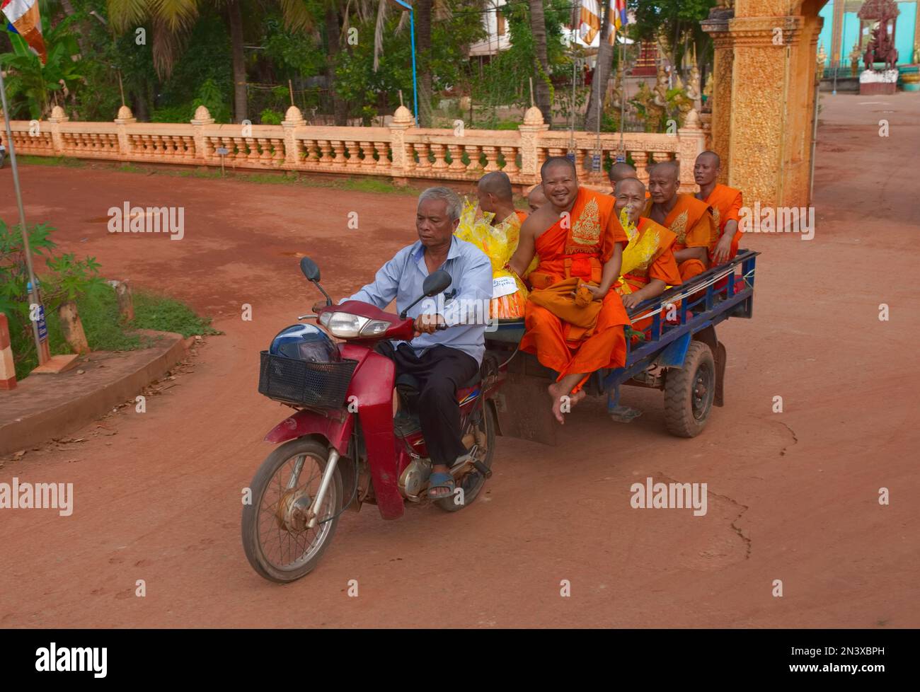 Buddhist monks leaving temple hi-res stock photography and images - Alamy