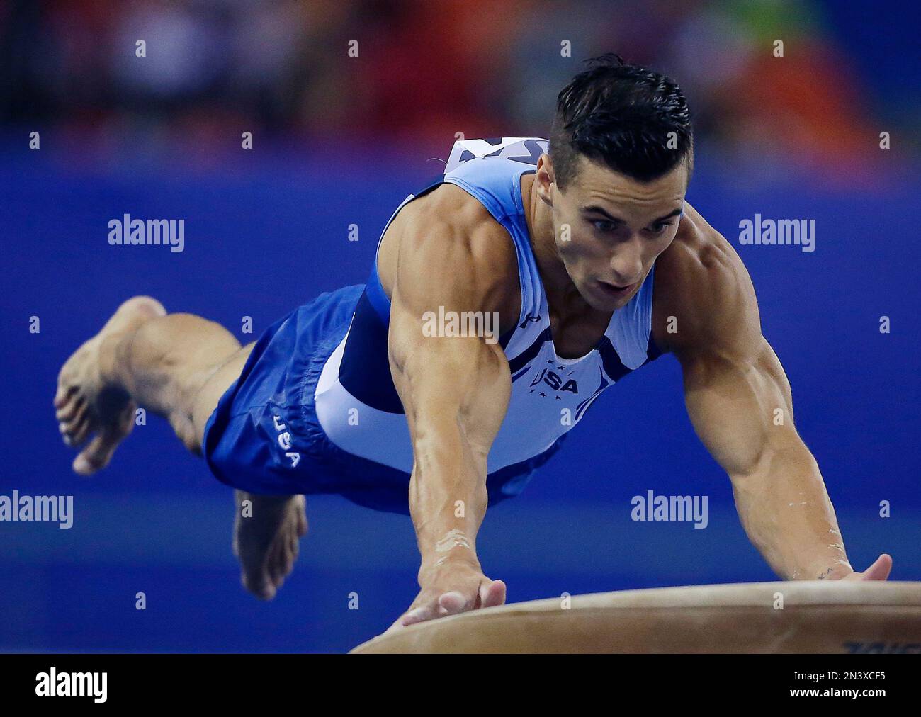 Jacob Dalton of the United States competes in the vault during the men ...