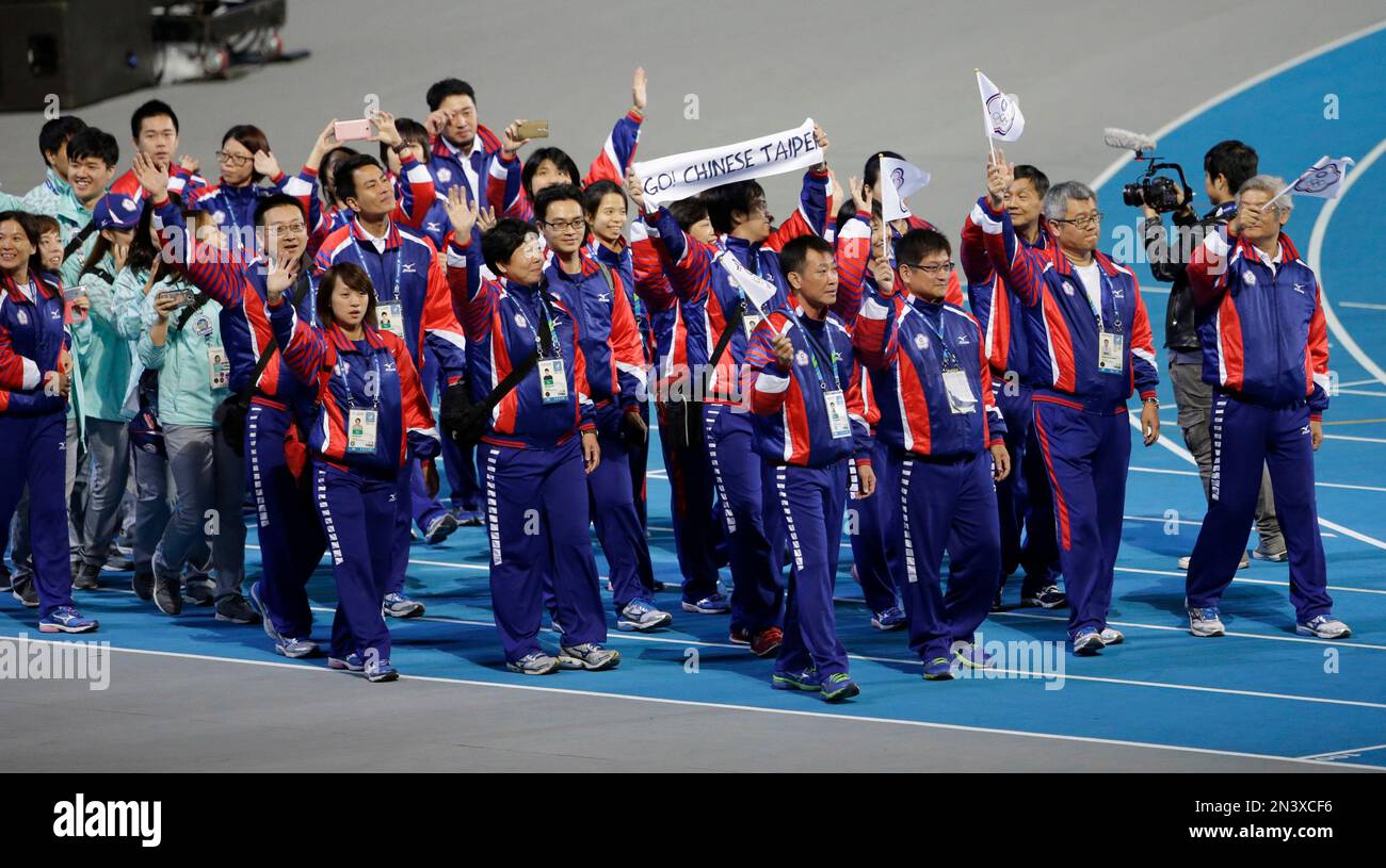 Taiwanese delegates march during the closing ceremony for the 17th ...