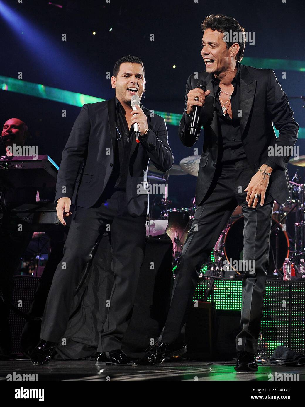 Marc Anthony and Tito El Bambino perform at the American Airlines Arena ...