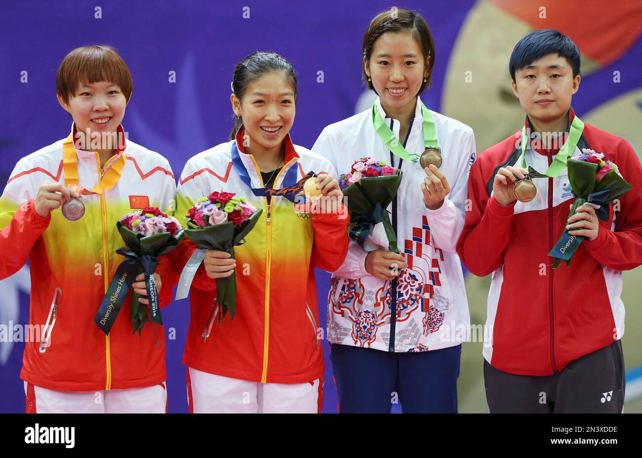 From left, silver medalist Zhu Yuling of China, gold medalist Liu ...