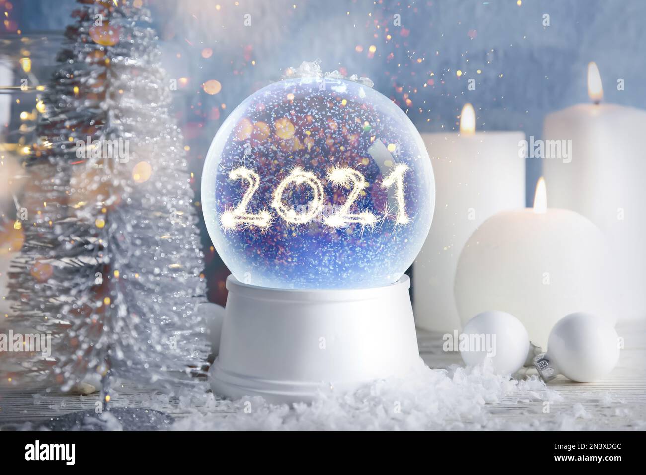 2021 New Year greeting card design. Snow globe with numbers Stock Photo ...