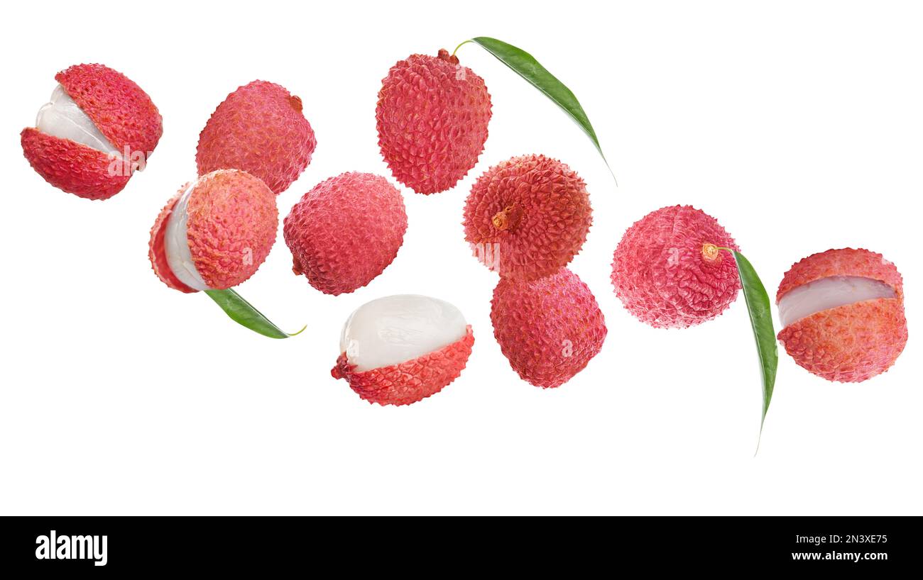 Set of falling delicious lychees on white background Stock Photo - Alamy