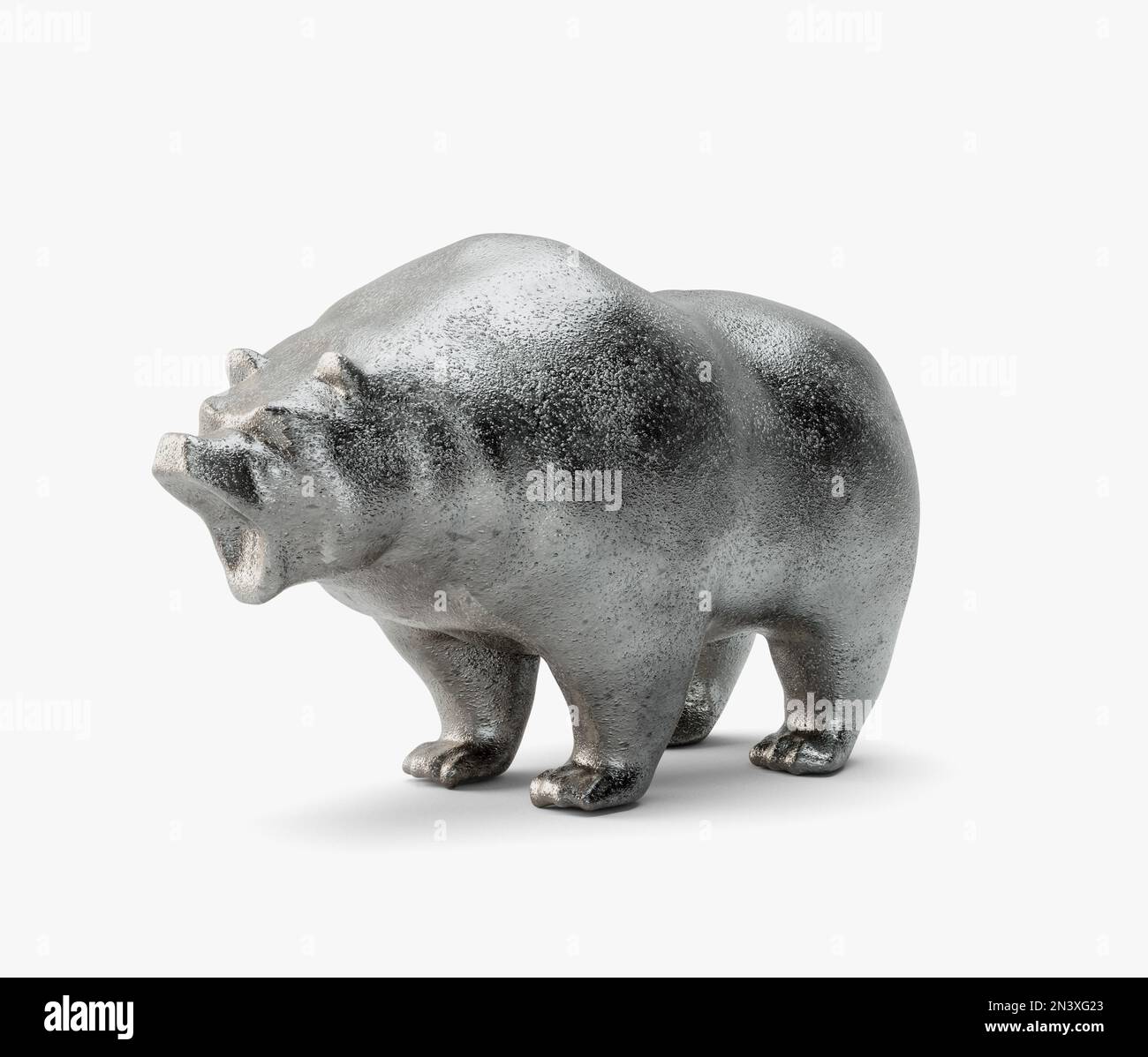 A token statuette depicting a silver bear on an isolated dark ...