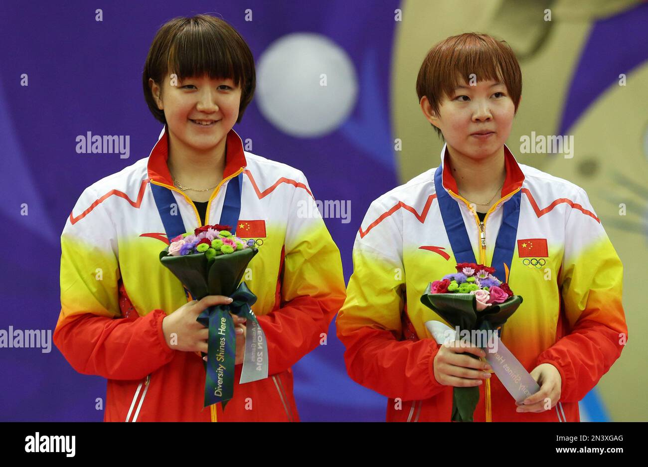 China's Zhu Yuling, right, and Chen Meng celebrate their gold medal ...