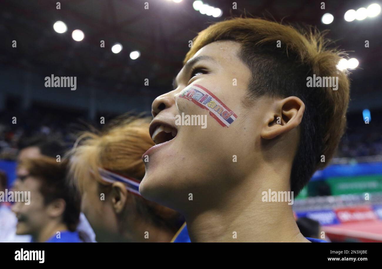 Thailand's Masaya Duangsri with a Tailand face paint celebrates after ...