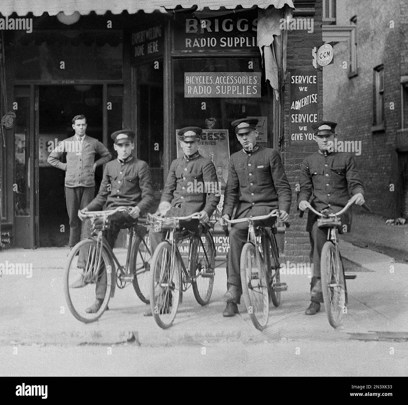 Boys on bike Black and White Stock Photos & Images - Alamy