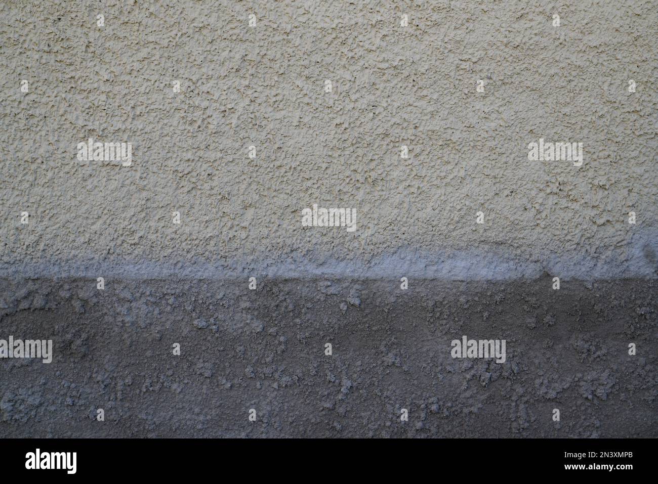 gray wall background of an old building painted in old white with touch ...