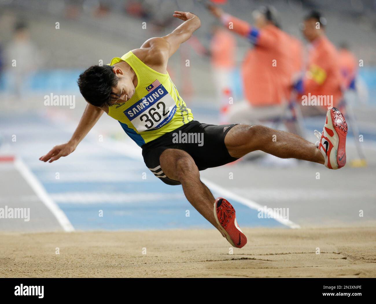 Malaysia's Muhammad Hakimi Bin Ismail competes in the men's triple jump ...
