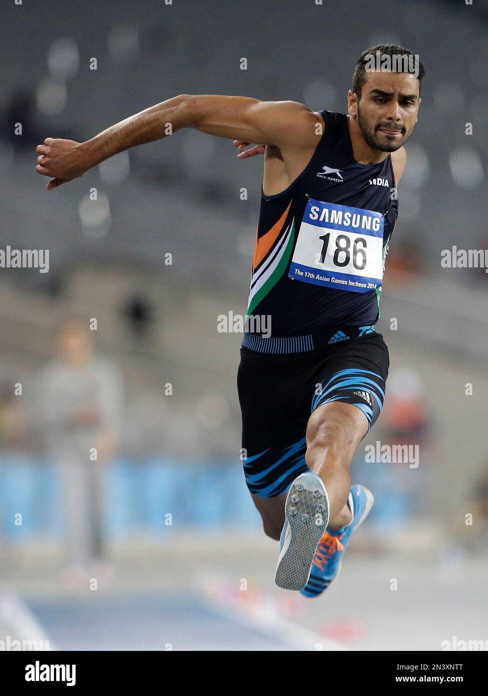 India's Arpinder Singh competes in the men's triple jump final at the ...