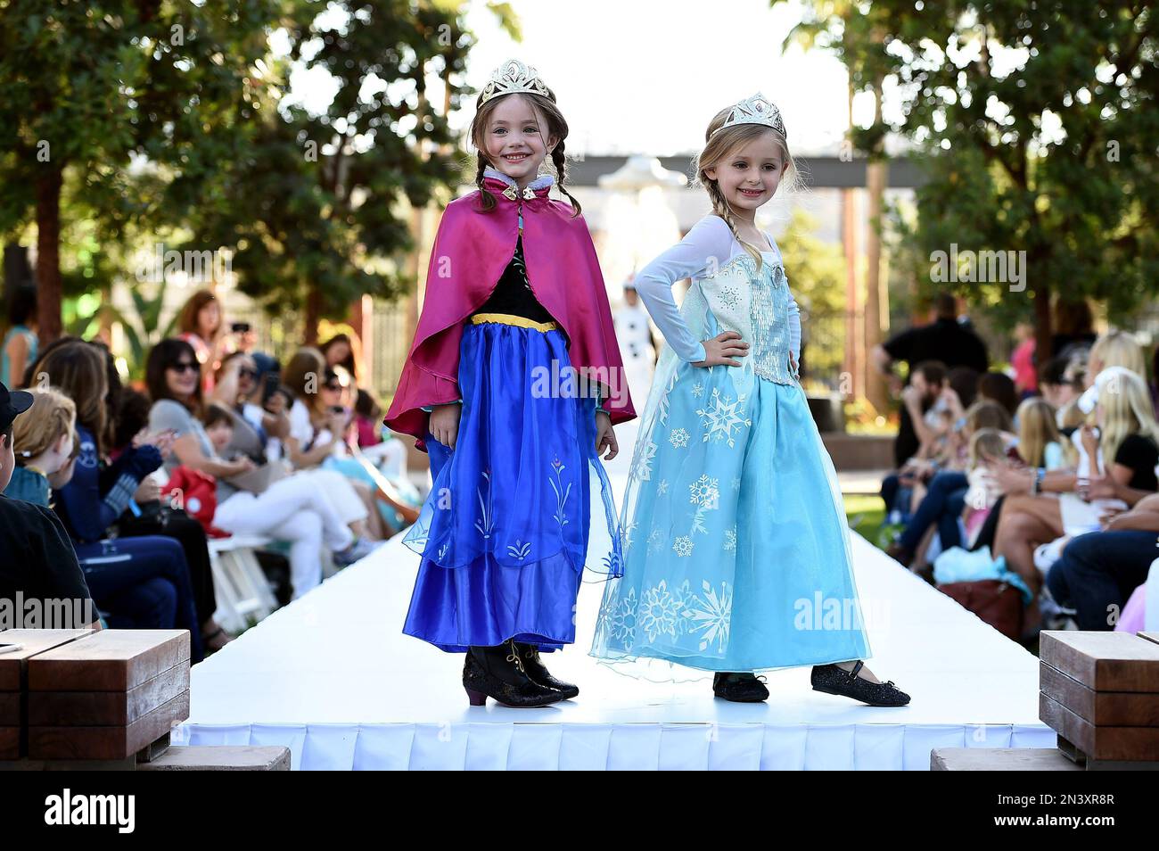 IMAGE DISTRIBUTED FOR DISNEY CONSUMER PRODUCTS - Models dressed up as ...