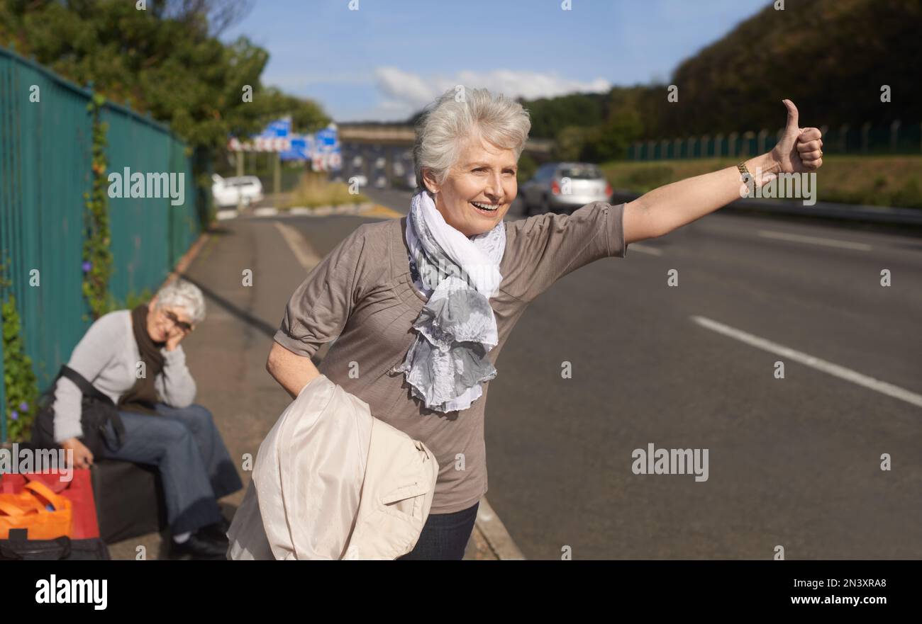 Woman hitching a ride hi-res stock photography and images - Alamy