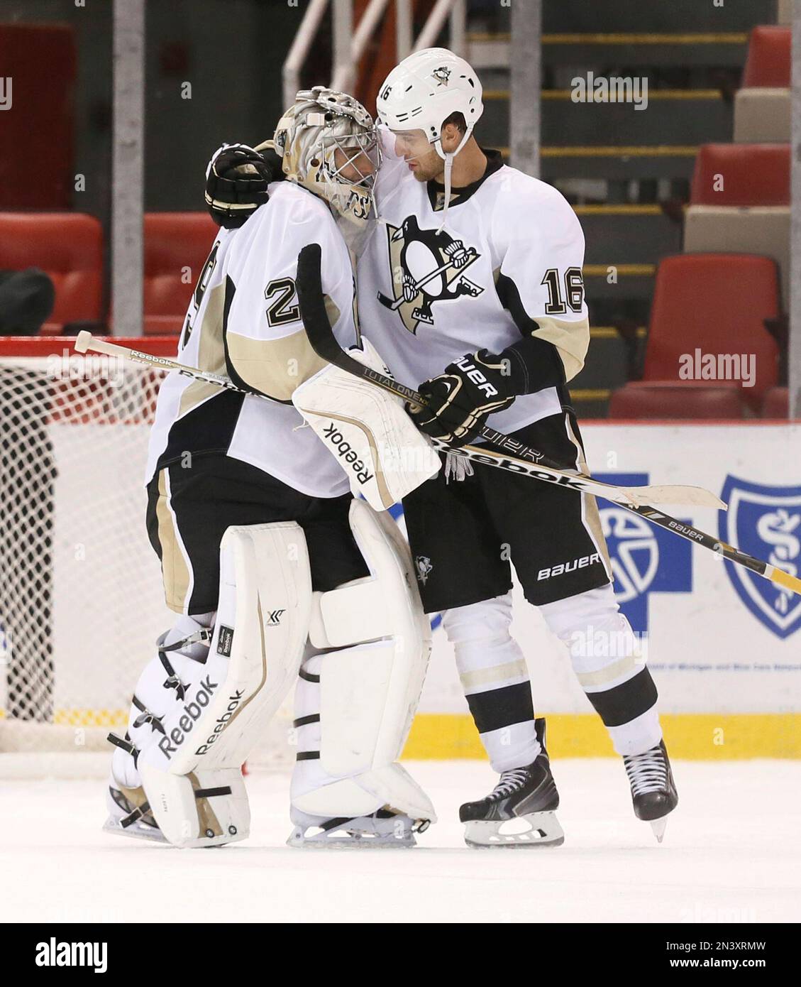 Pittsburgh Penguins goalie Marc-Andre Fleury (29) is congratulated by ...