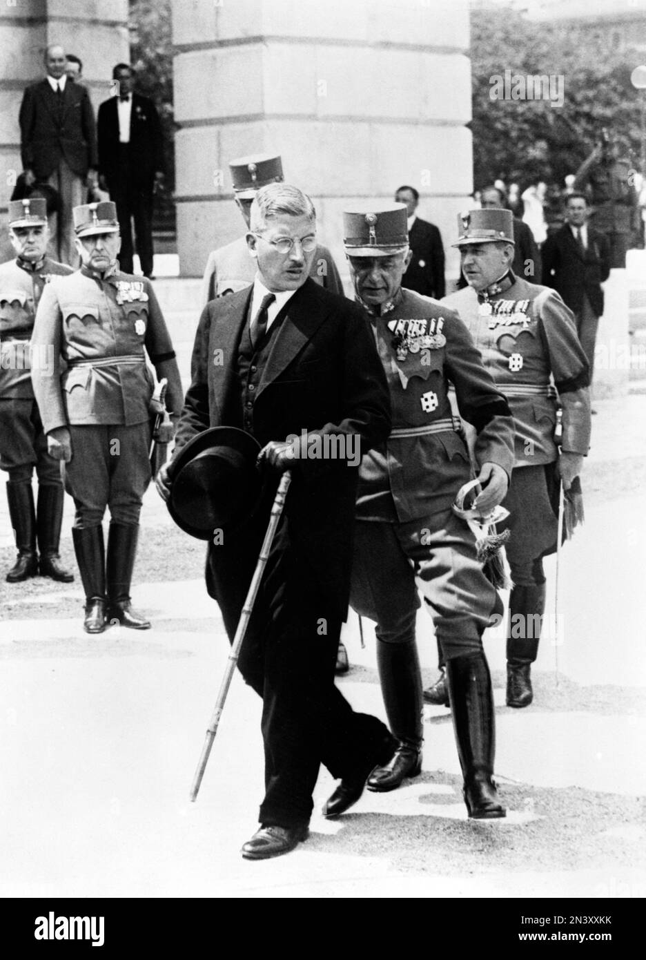 Chancellor Kurt von Schuschnigg, with cane, left the Vienna War ...