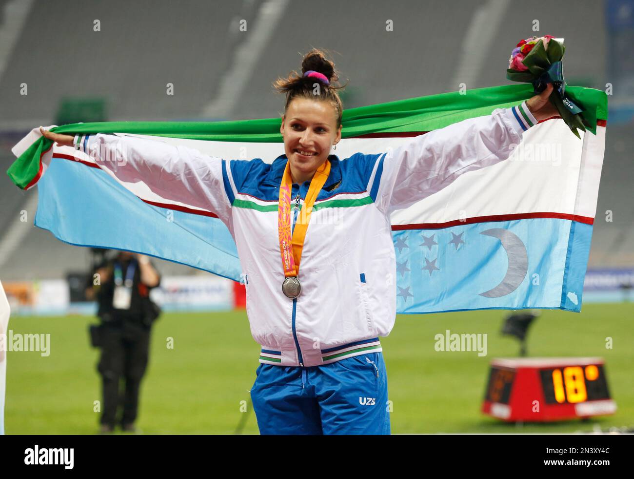 Silver medal winner Uzbekistan's Aleksandra Kotlyarova celebrates after ...